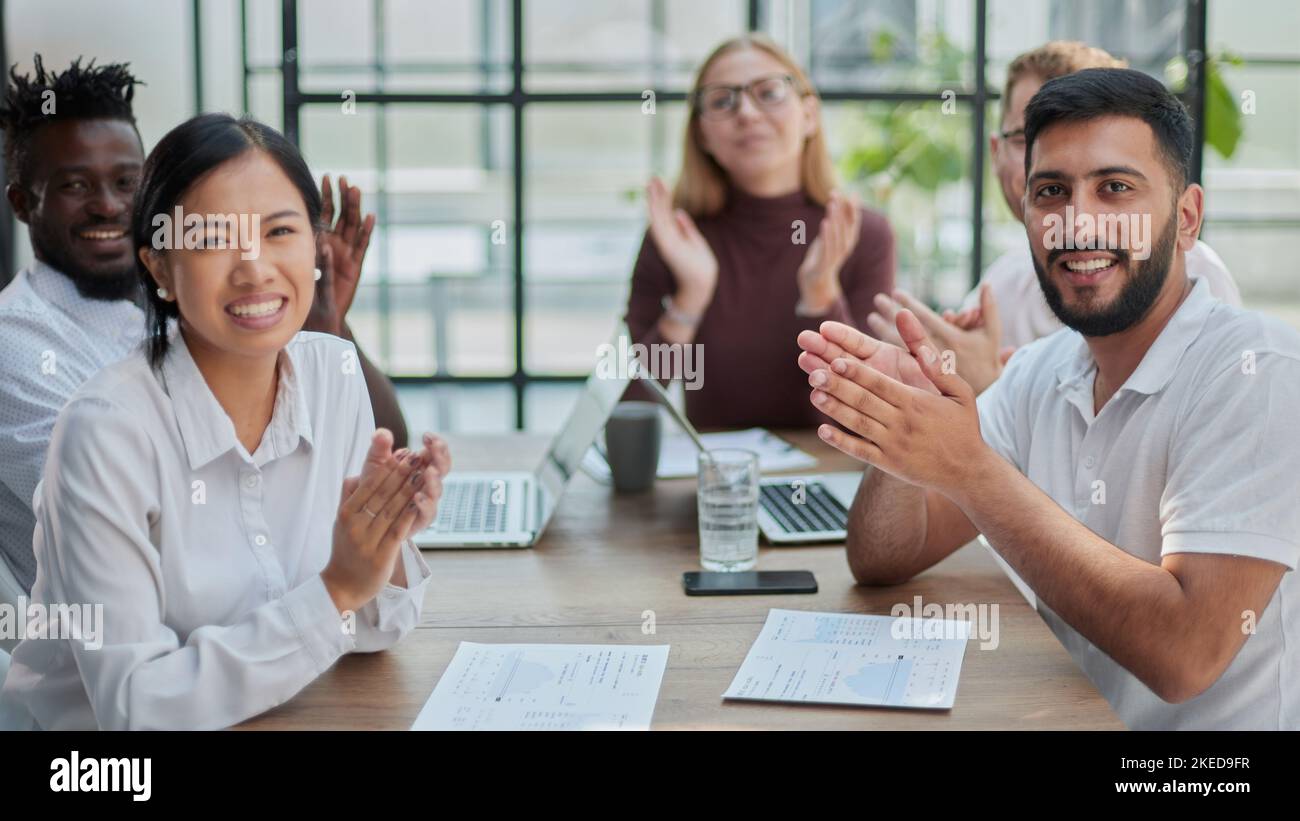 group of different business people celebrating victory while Stock ...