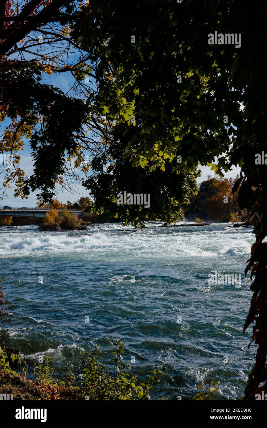 Niagara Falls from the American and Canadian sides. Rainbow over the ...