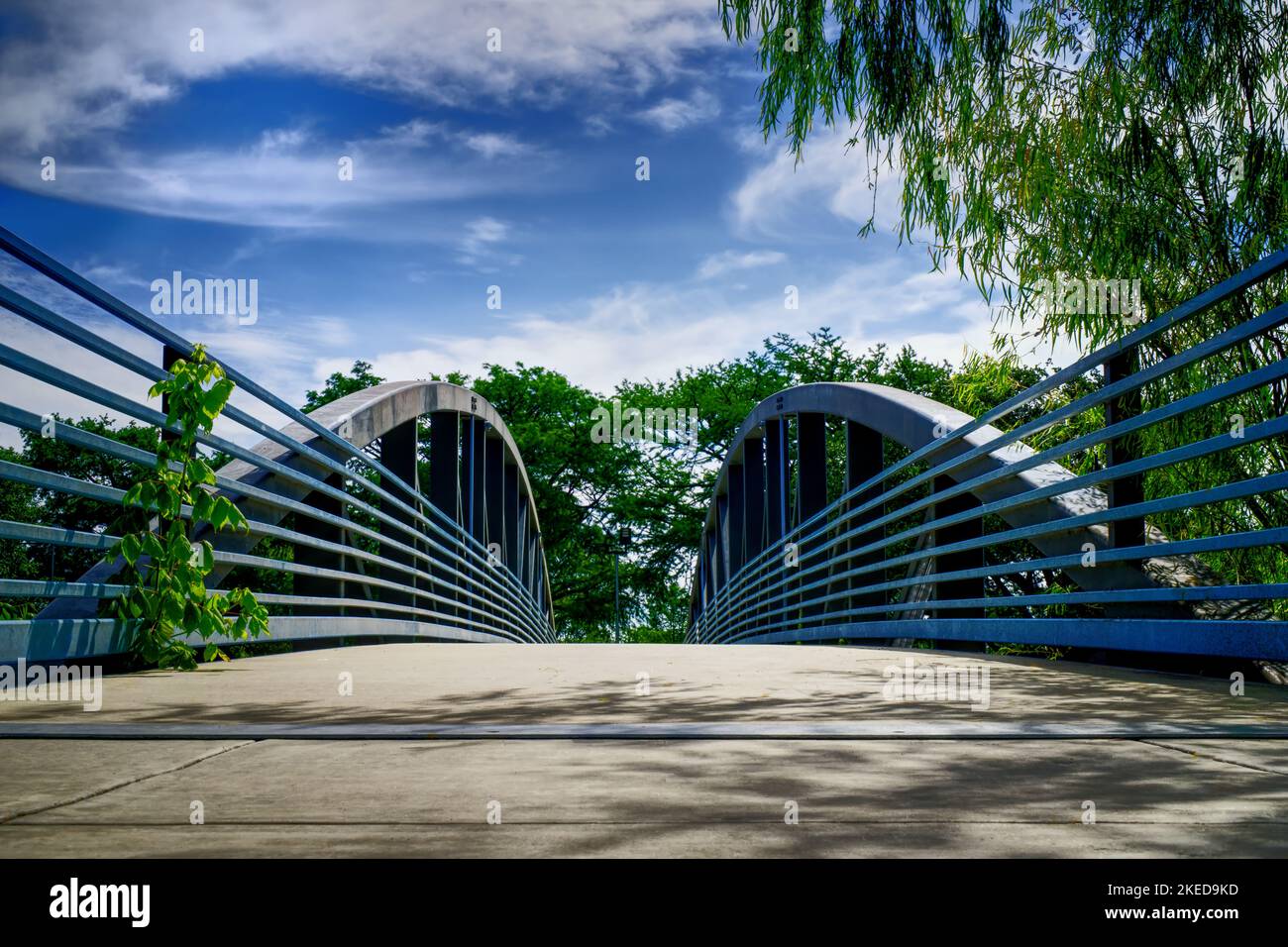 Steel pedestrian bridge Stock Photo - Alamy
