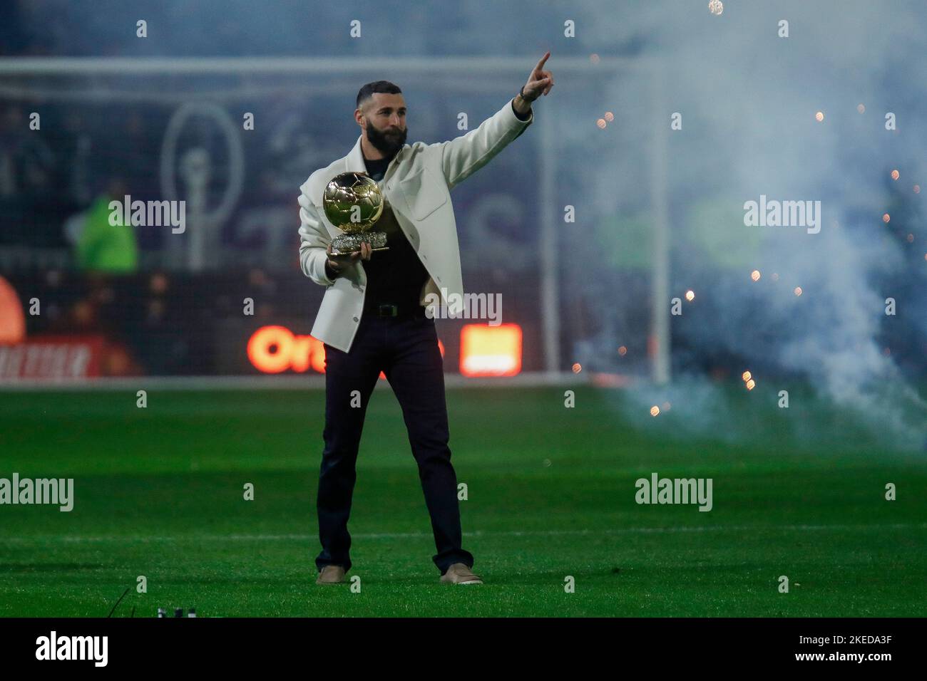 Karim Benzema of Real Madrid shows the Golden Ball (Ballon D’Or) to the ...