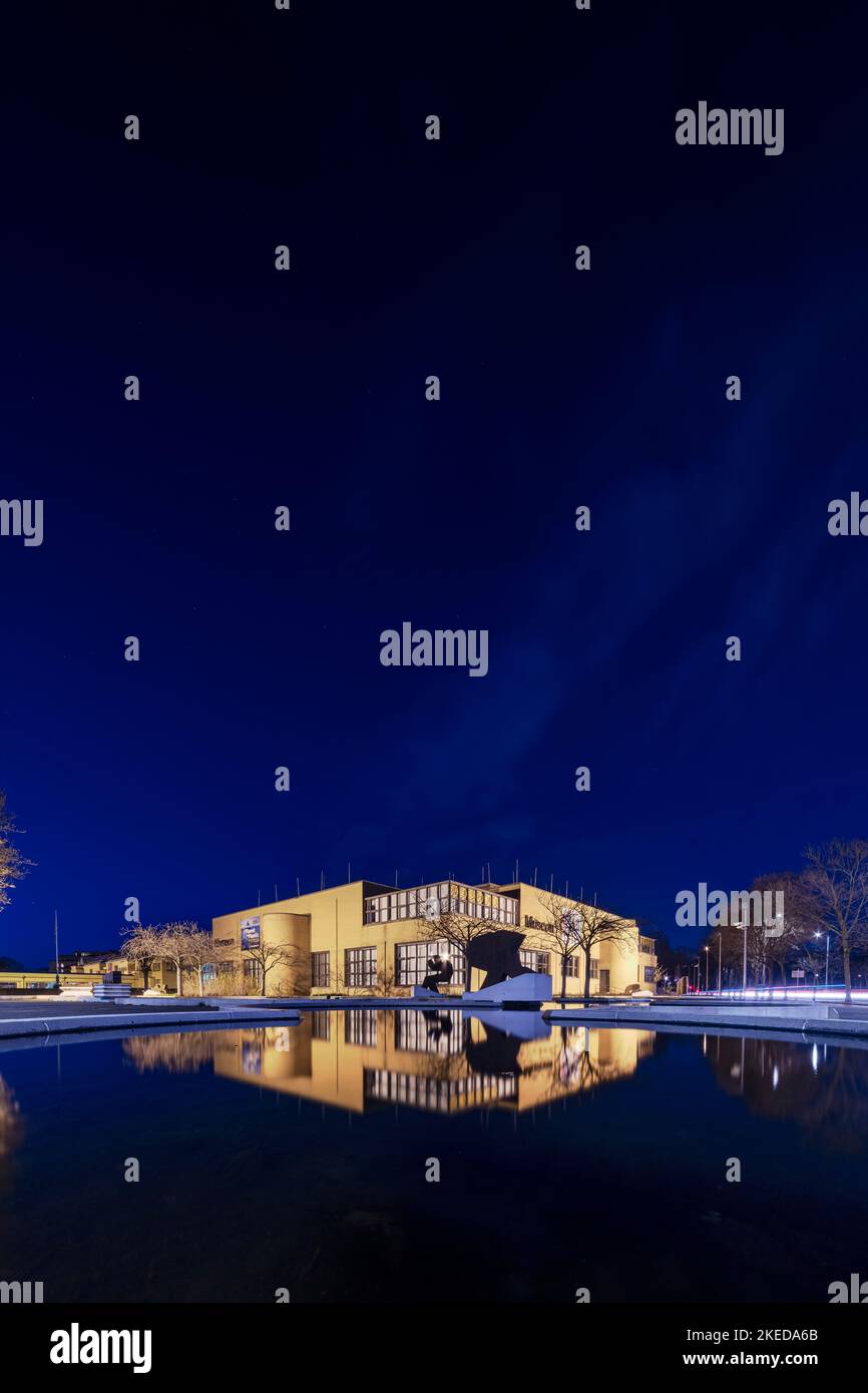 Reflection on the calm pond water of the Museon, The Hague municipality ...