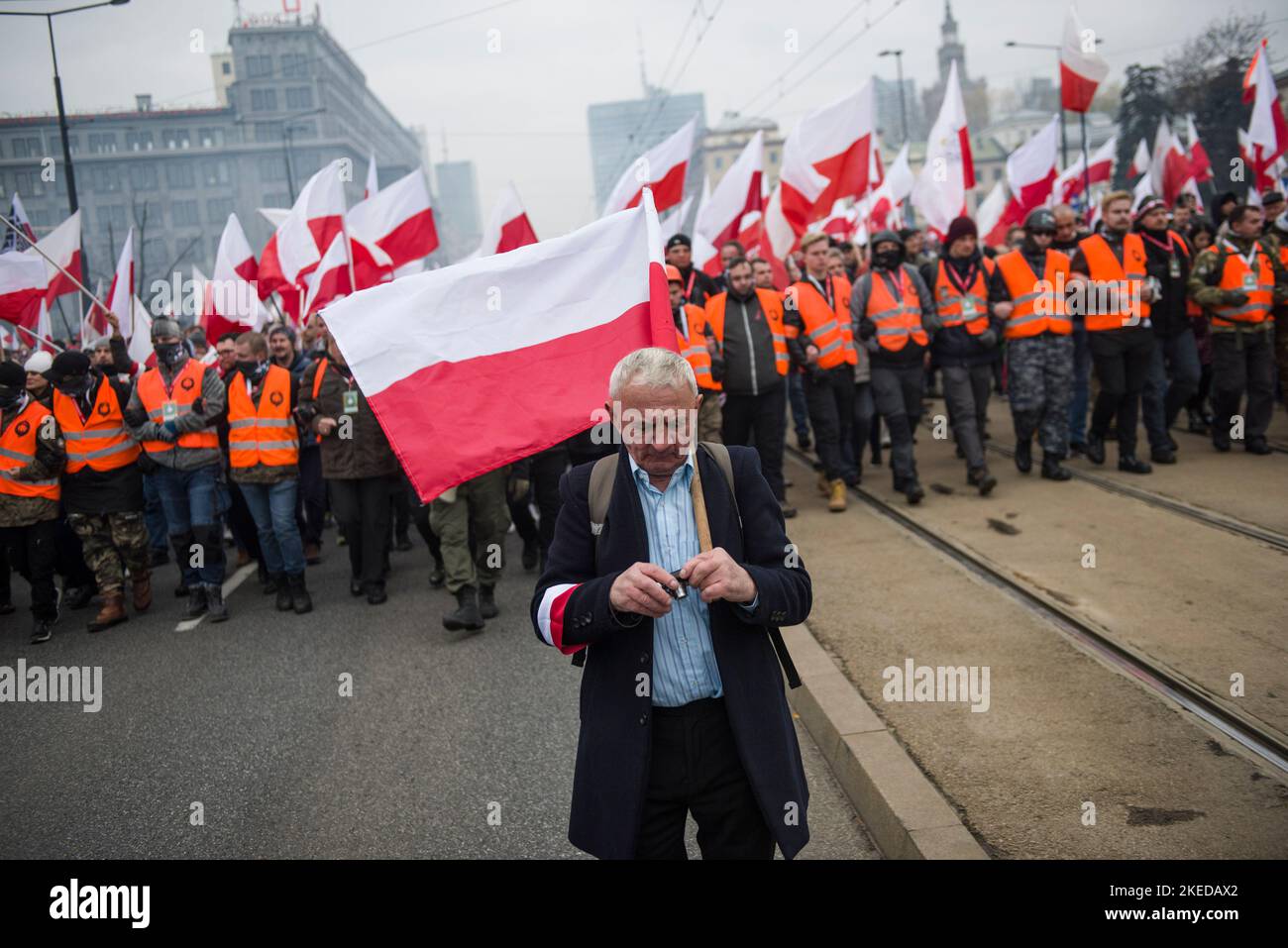 Polish nationalists wave Polish flags during the Independence March ...