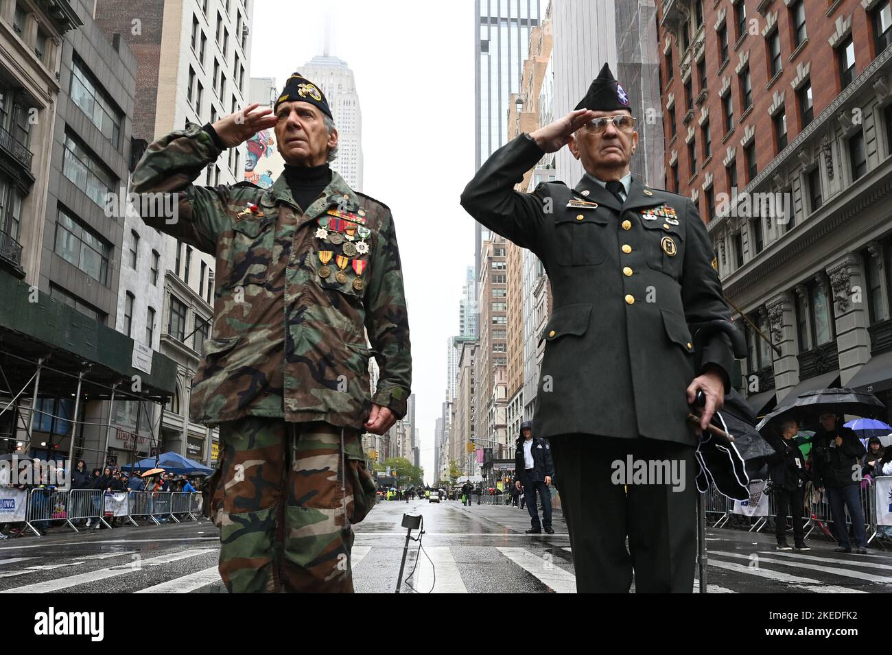 Vietnam veterans George Arnone and Vincent Bocchicchio salute before ...