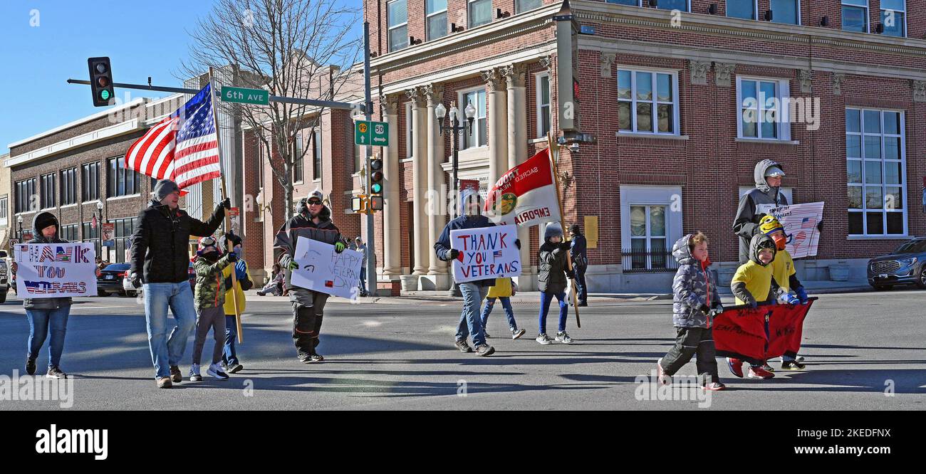 Emporia, Kansas, USA. 11th Nov, 2022. from Scared Heart Church march up ...