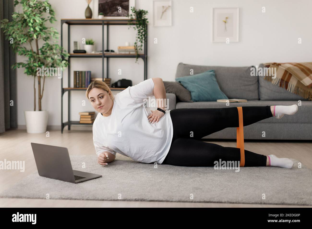 Woman training legs band hi-res stock photography and images - Alamy