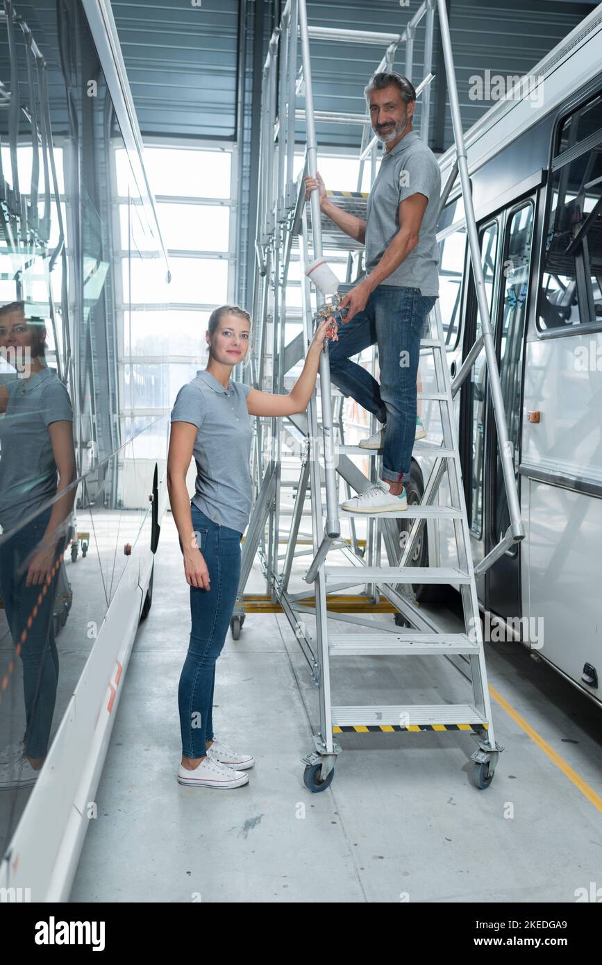 yong woman trainee with the master Stock Photo - Alamy