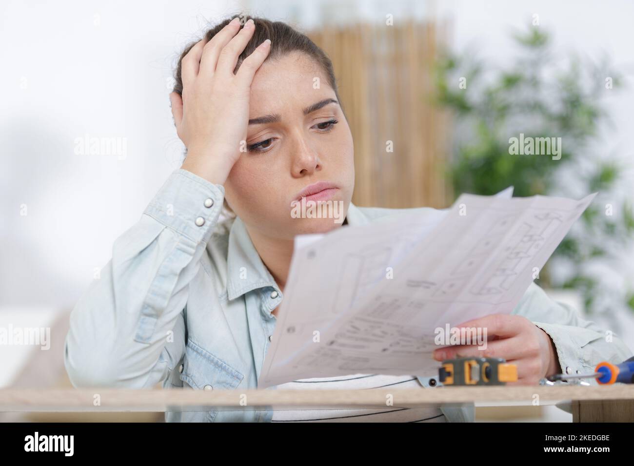 Worried fatigued business woman hi-res stock photography and images - Alamy