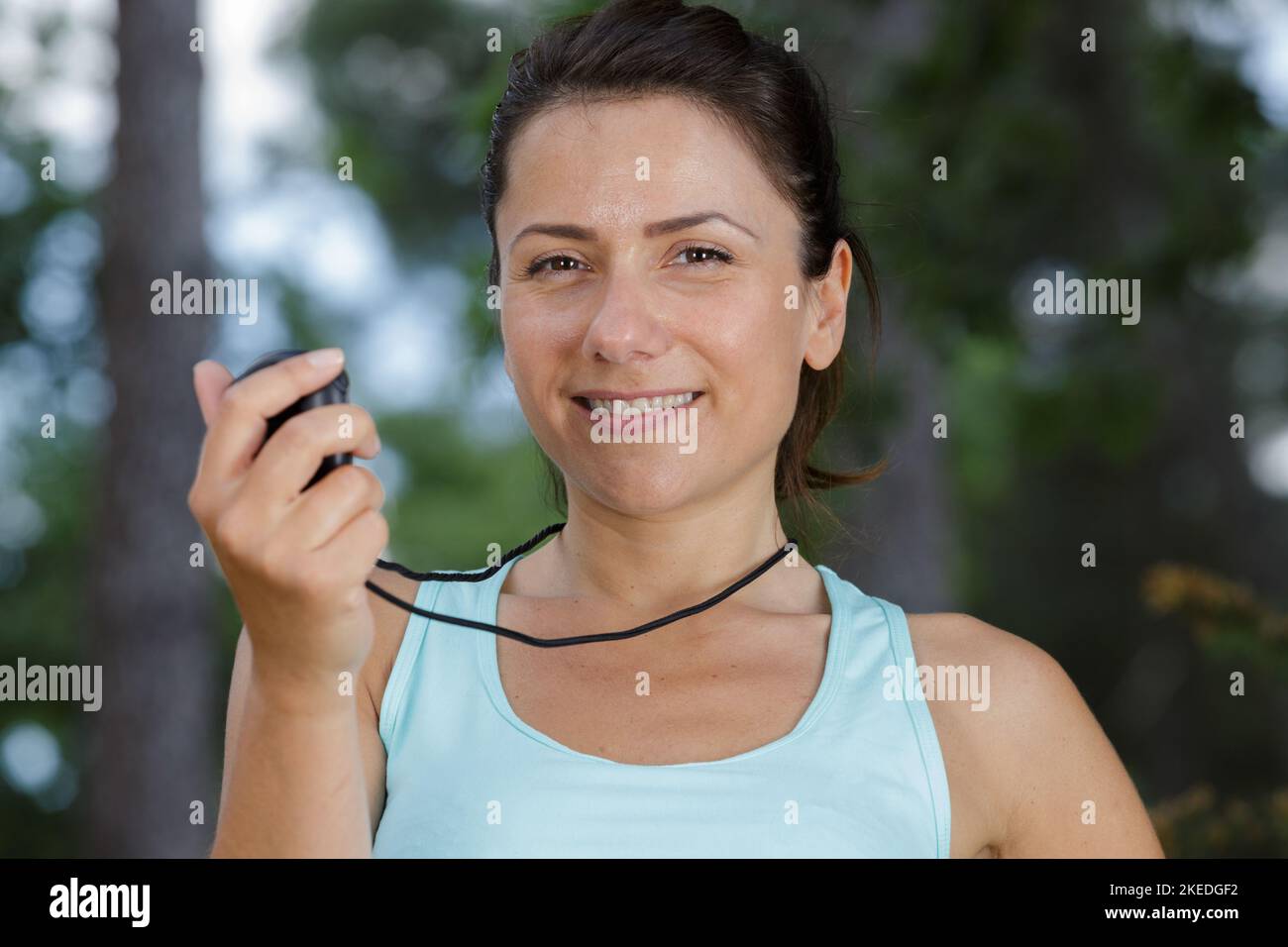 female hand holding digital stopwatch outdoors Stock Photo - Alamy