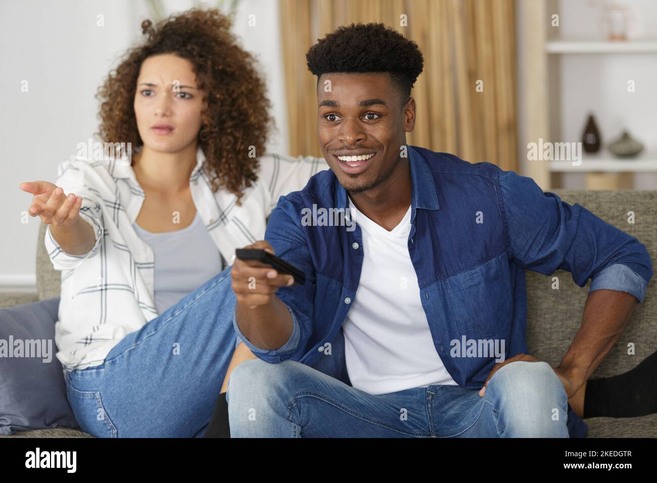 emotional couple watching football match tv Stock Photo - Alamy