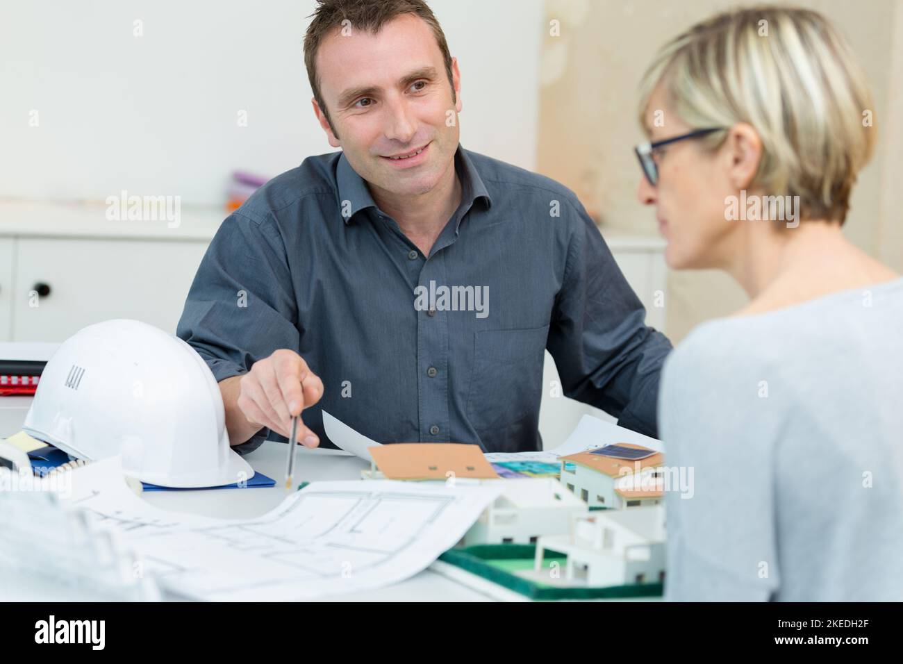 architecture engineering teamwork meeting at workplace Stock Photo - Alamy