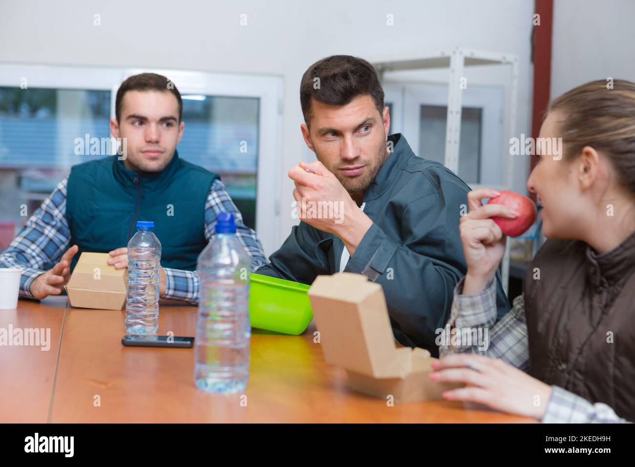 workers having a lunch break Stock Photo - Alamy
