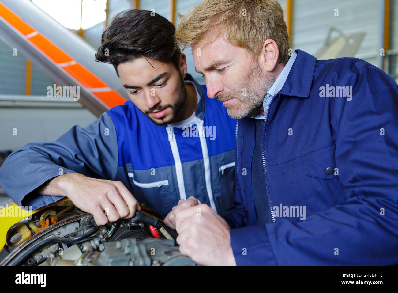 Two professional car mechanics hi-res stock photography and images - Alamy