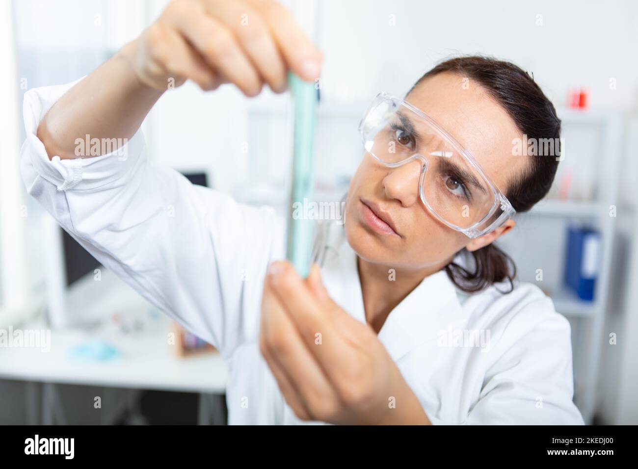 Female scientist focused thoughtful hi-res stock photography and images ...