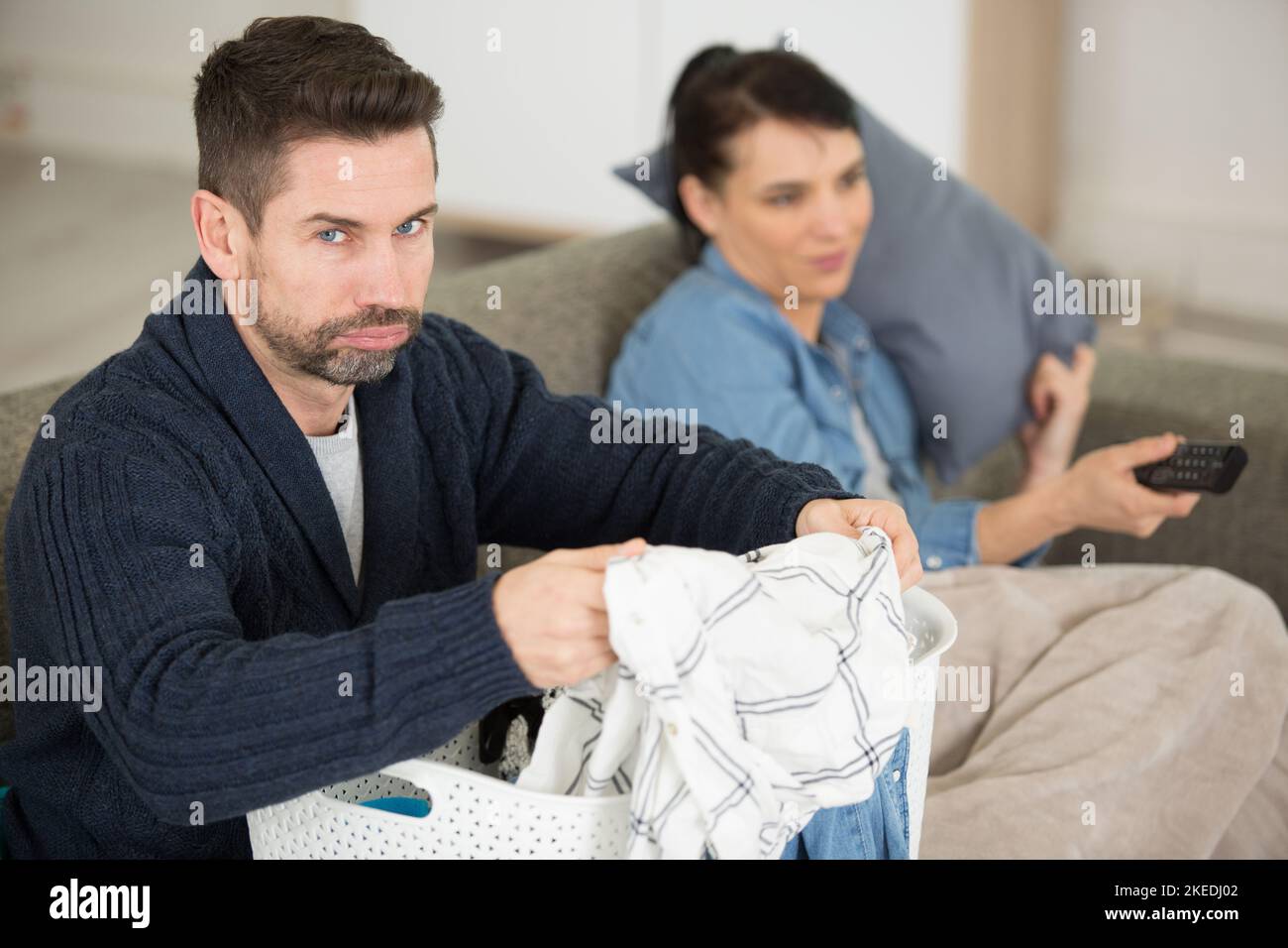 Man cleaning house helping wife hi-res stock photography and images - Alamy