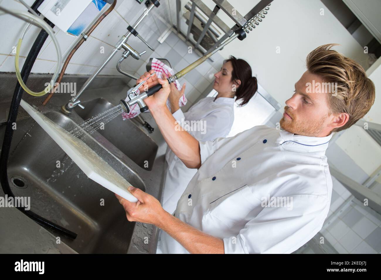 Man doing washing up home hi-res stock photography and images - Alamy