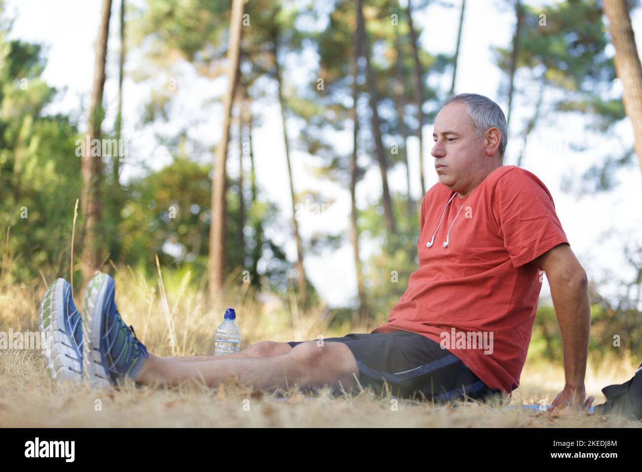 man having a pause from exercise Stock Photo - Alamy
