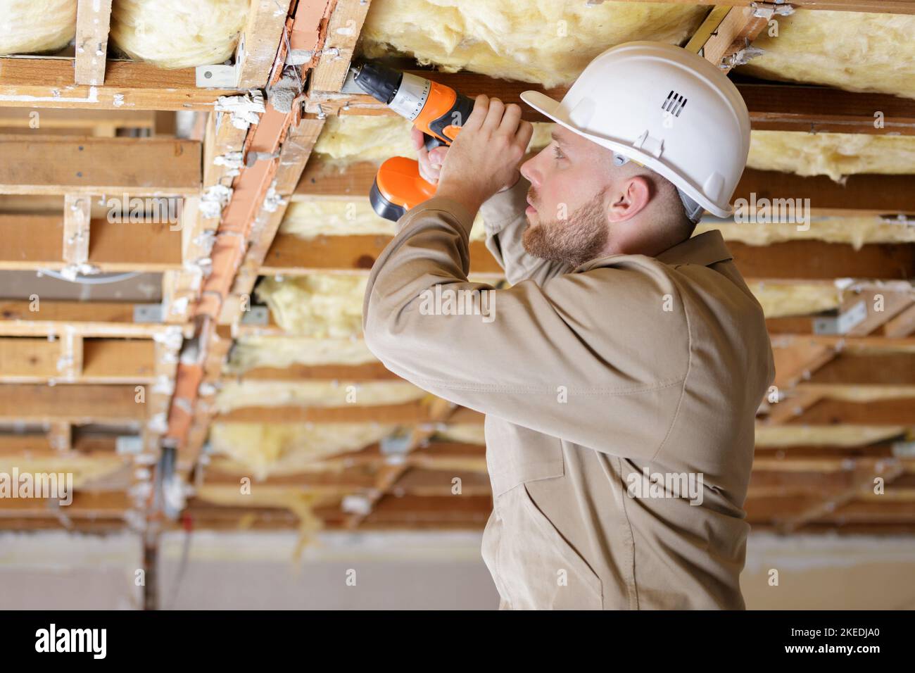 a man is drilling structure Stock Photo - Alamy