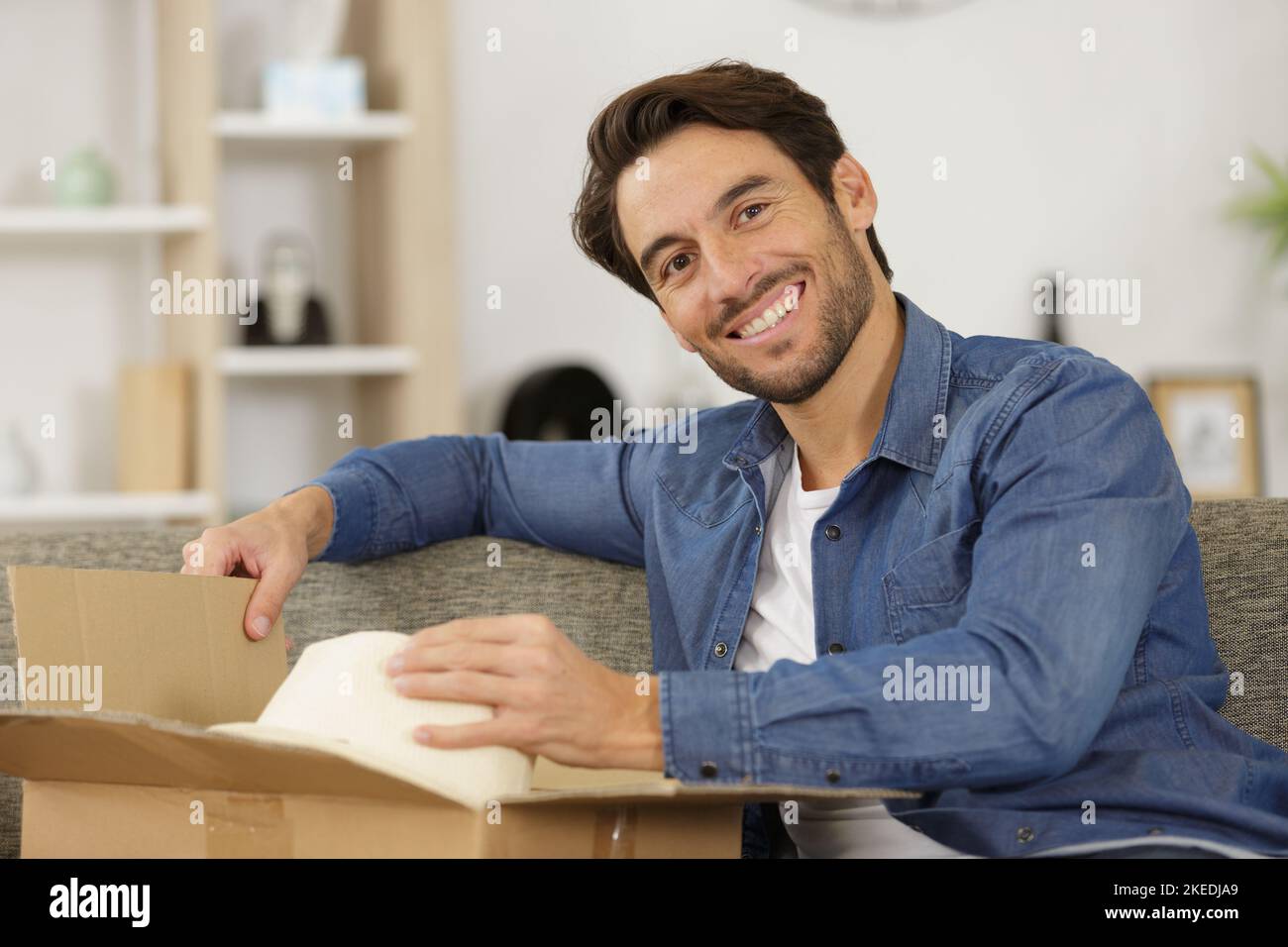 Unpacking goods hi-res stock photography and images - Alamy