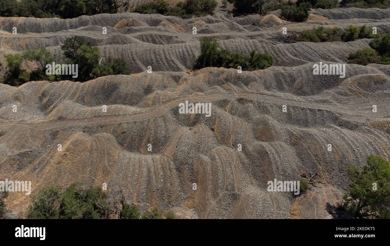 The Tailing piles of river rocks from gold mining during the gold rush ...