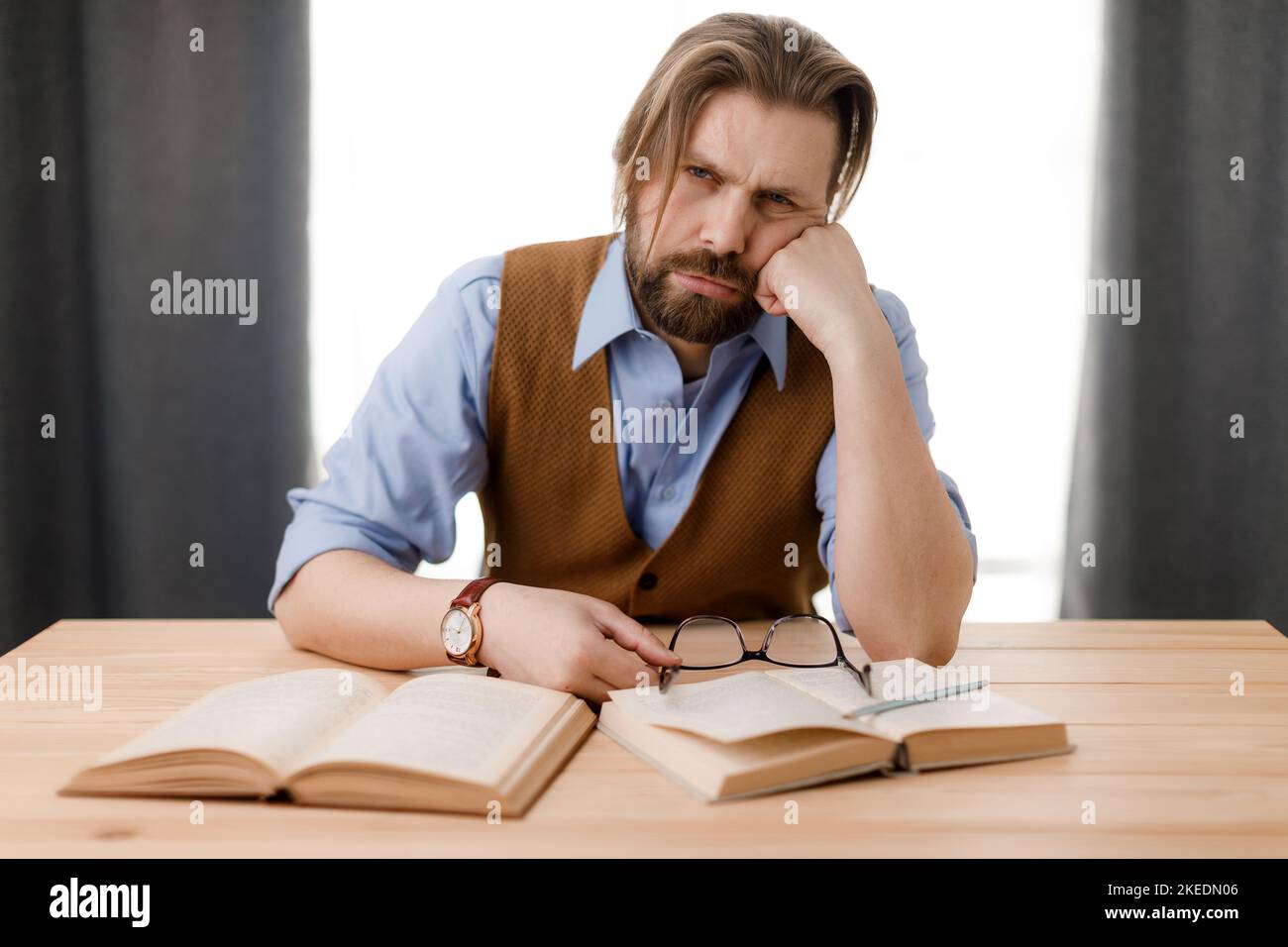 Bored teacher during distance learning Stock Photo - Alamy