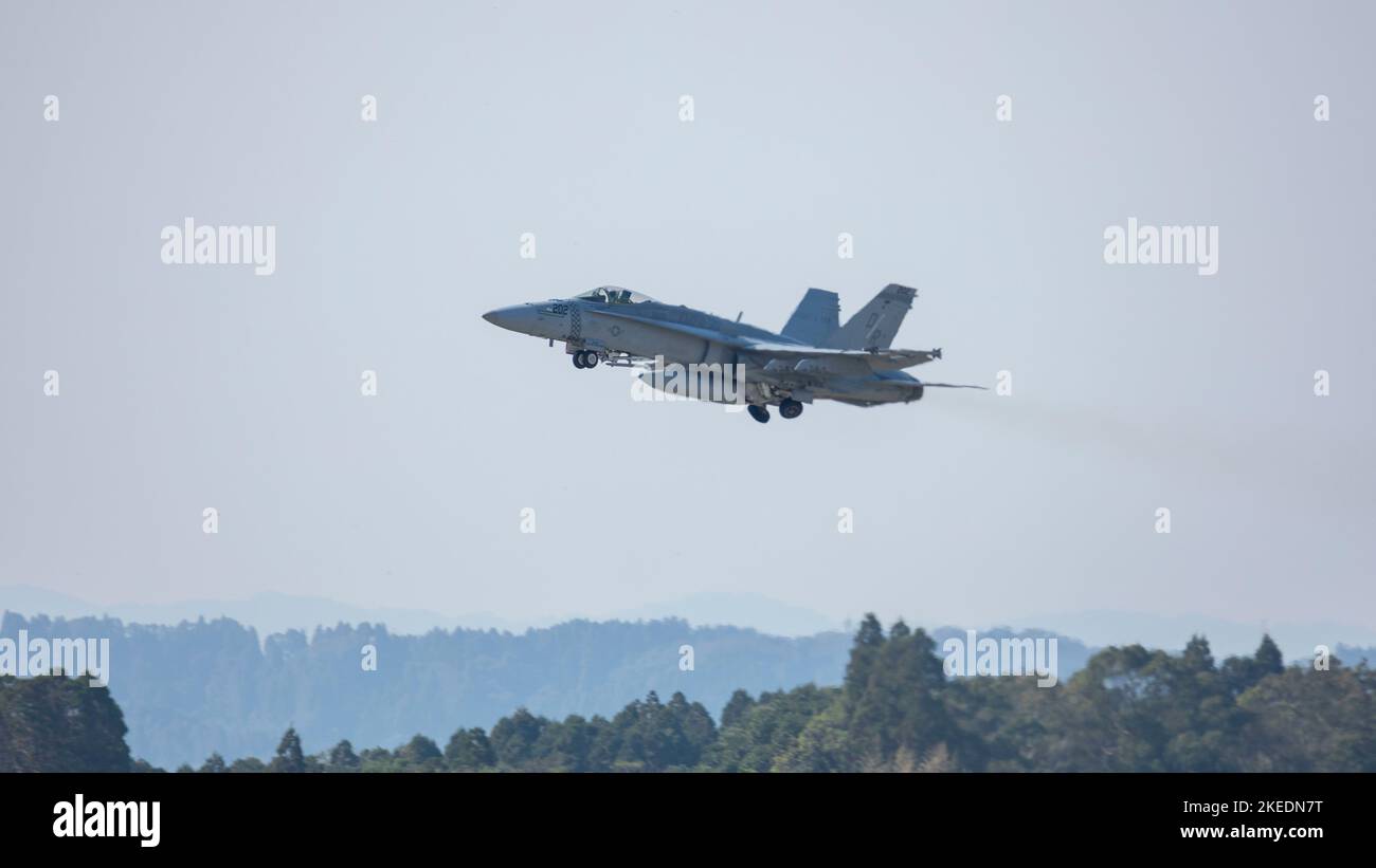 A U.S. Marine Corps F/A-18C Hornet aircraft with Marine Fighter Attack ...