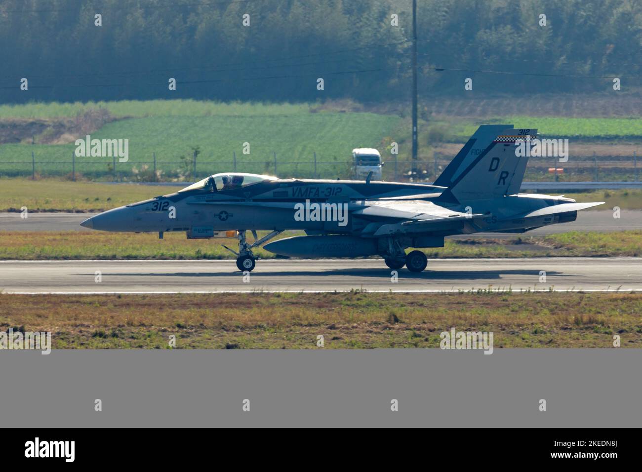 A U.S. Marine Corps F/A-18C Hornet aircraft with Marine Fighter Attack ...