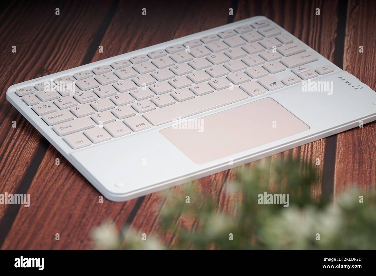 working with wireless external portable keyboard Stock Photo - Alamy