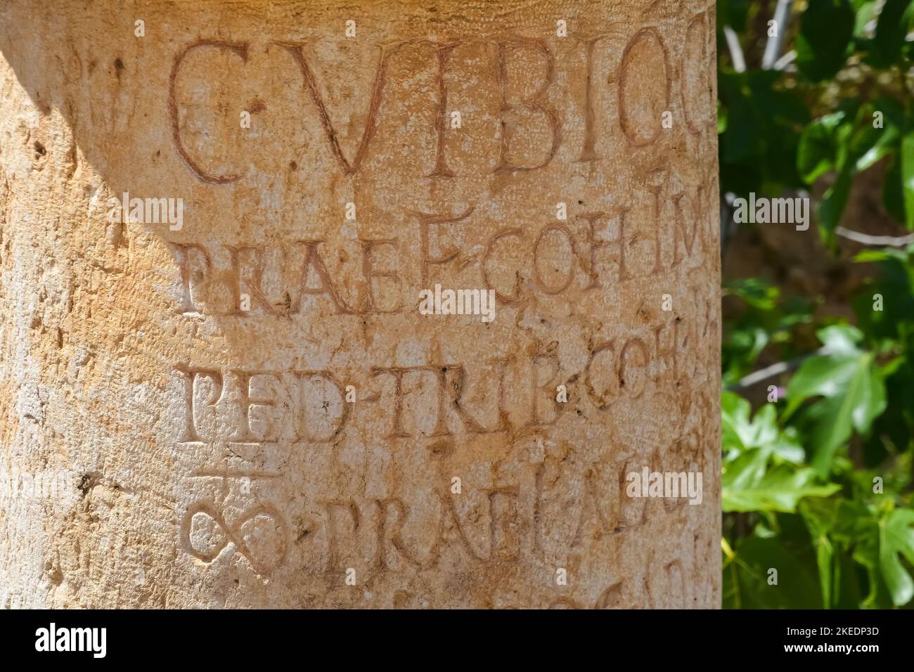 A closeup of an ancient Greek inscriptions on the pillar of the Roman ...
