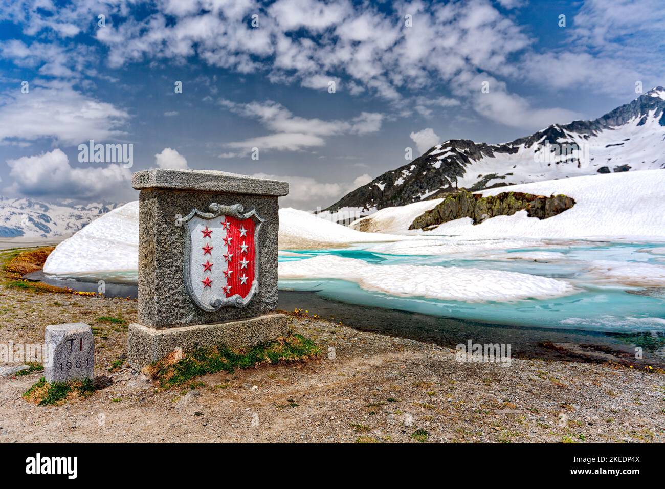 The monument of Flag and coat of arms of the canton of Valais with ...