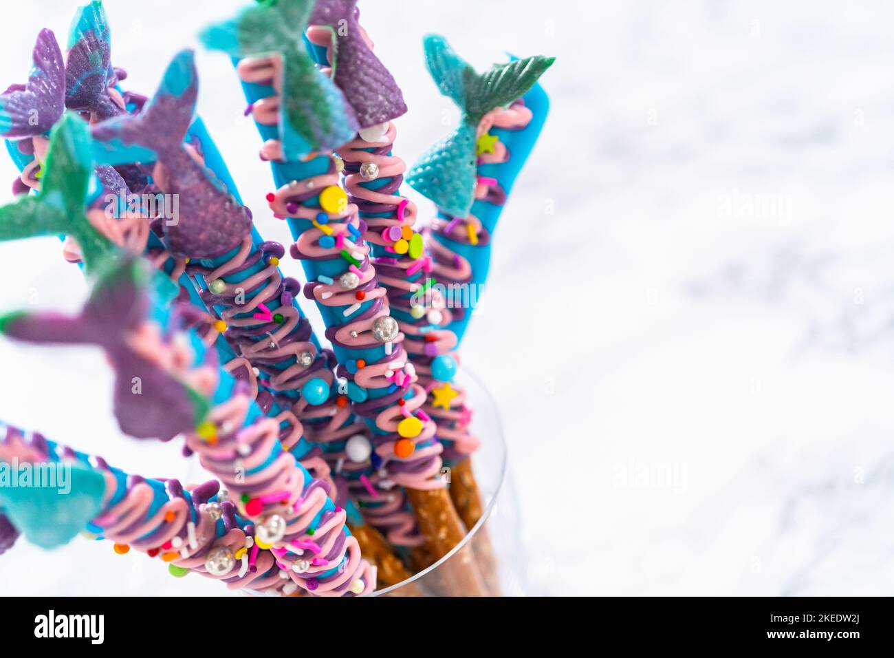 Mermaid chocolate pretzel rods Stock Photo - Alamy