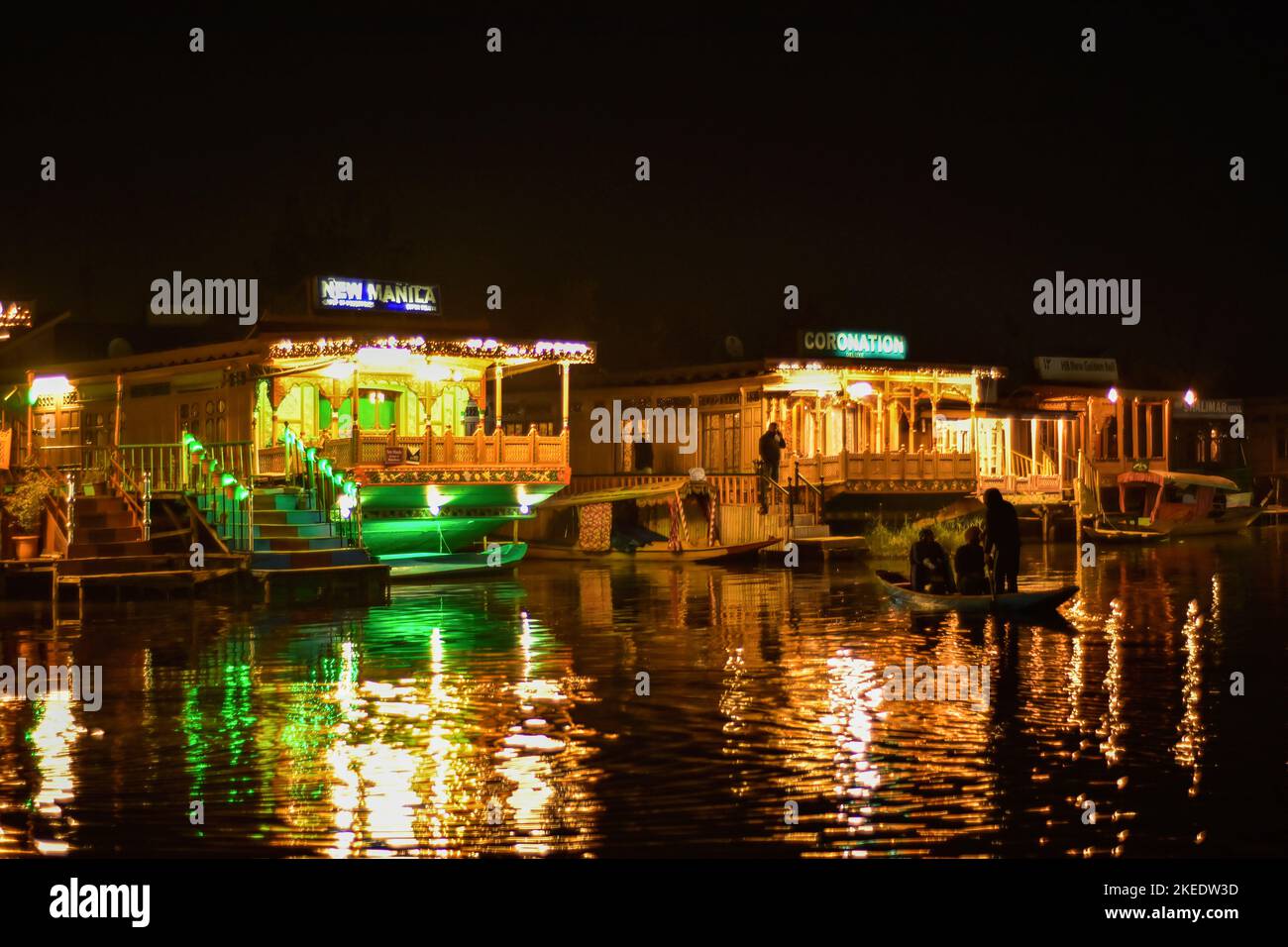 A boatman seen ferrying Indian tourists across the world famous Dal lake during a cold evening ...