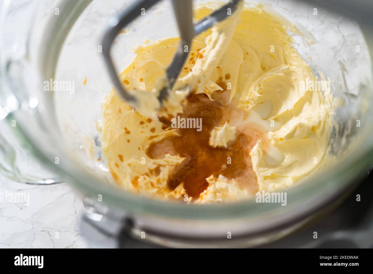 Mini Vanilla Cupcakes with Pink Buttercream Frosting Stock Photo - Alamy
