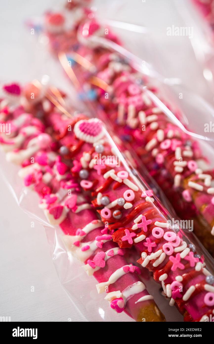 Valentine's Day Chocolate Covered Pretzel Rods Stock Photo - Alamy