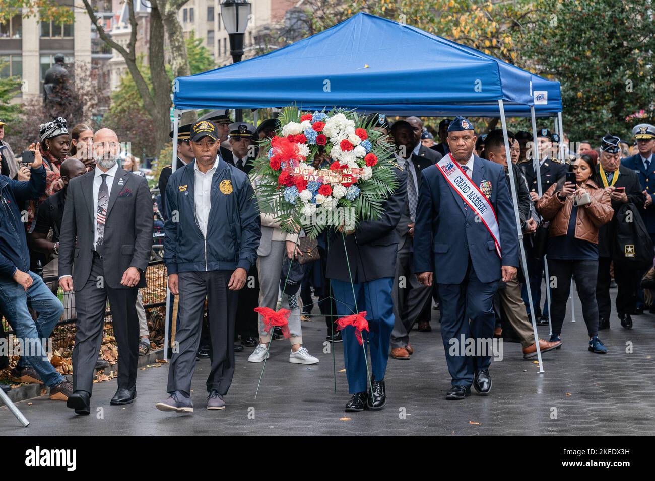 Mayor Eric Adams (2nd (L) and grand marshal Vincent Patton III (R ...