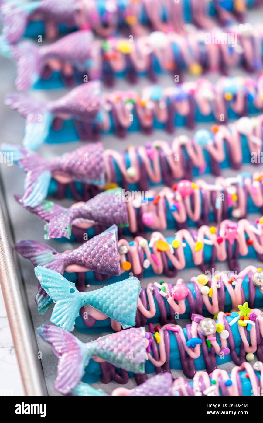 Mermaid chocolate pretzel rods Stock Photo - Alamy