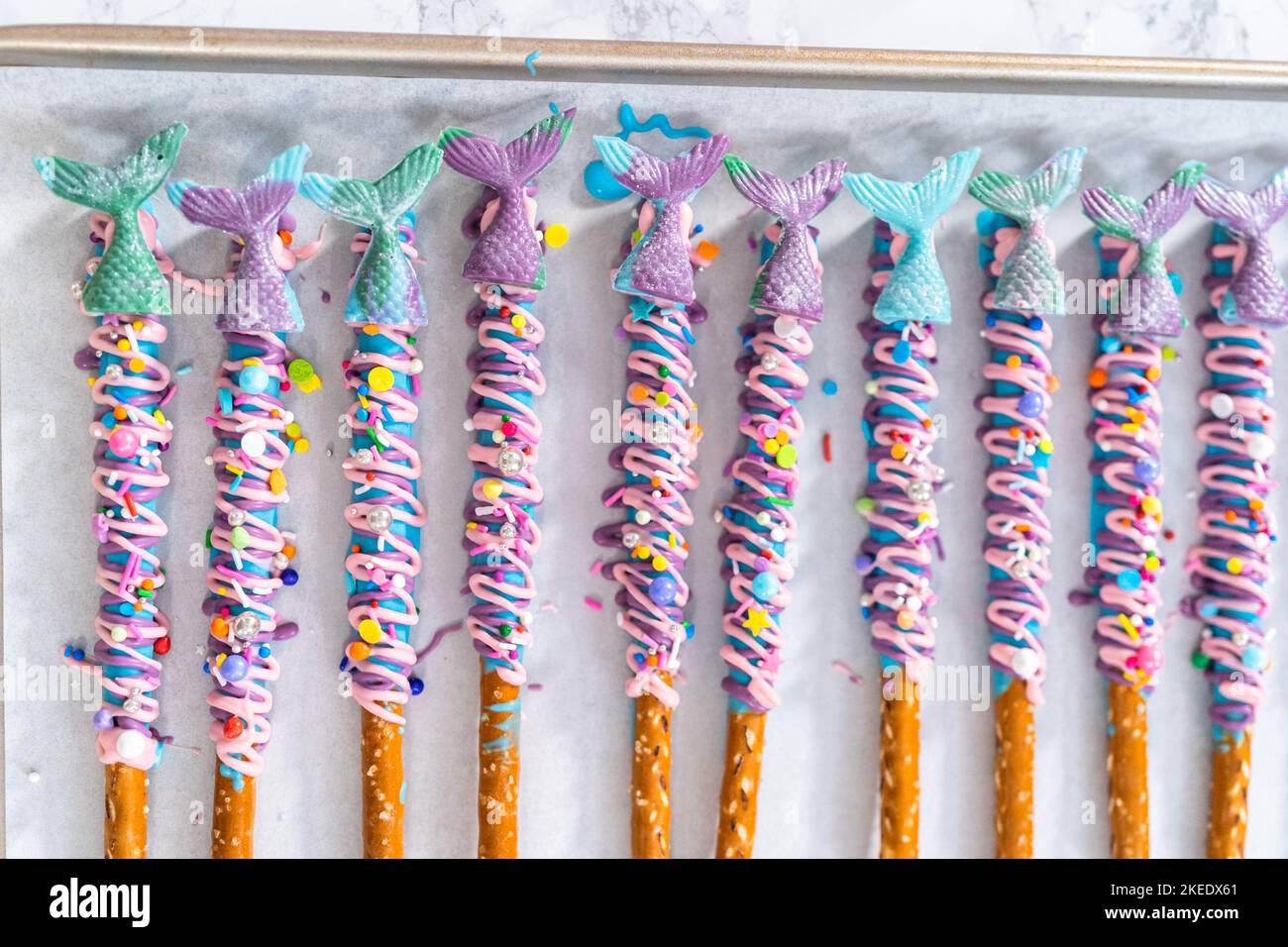 Mermaid chocolate pretzel rods Stock Photo - Alamy