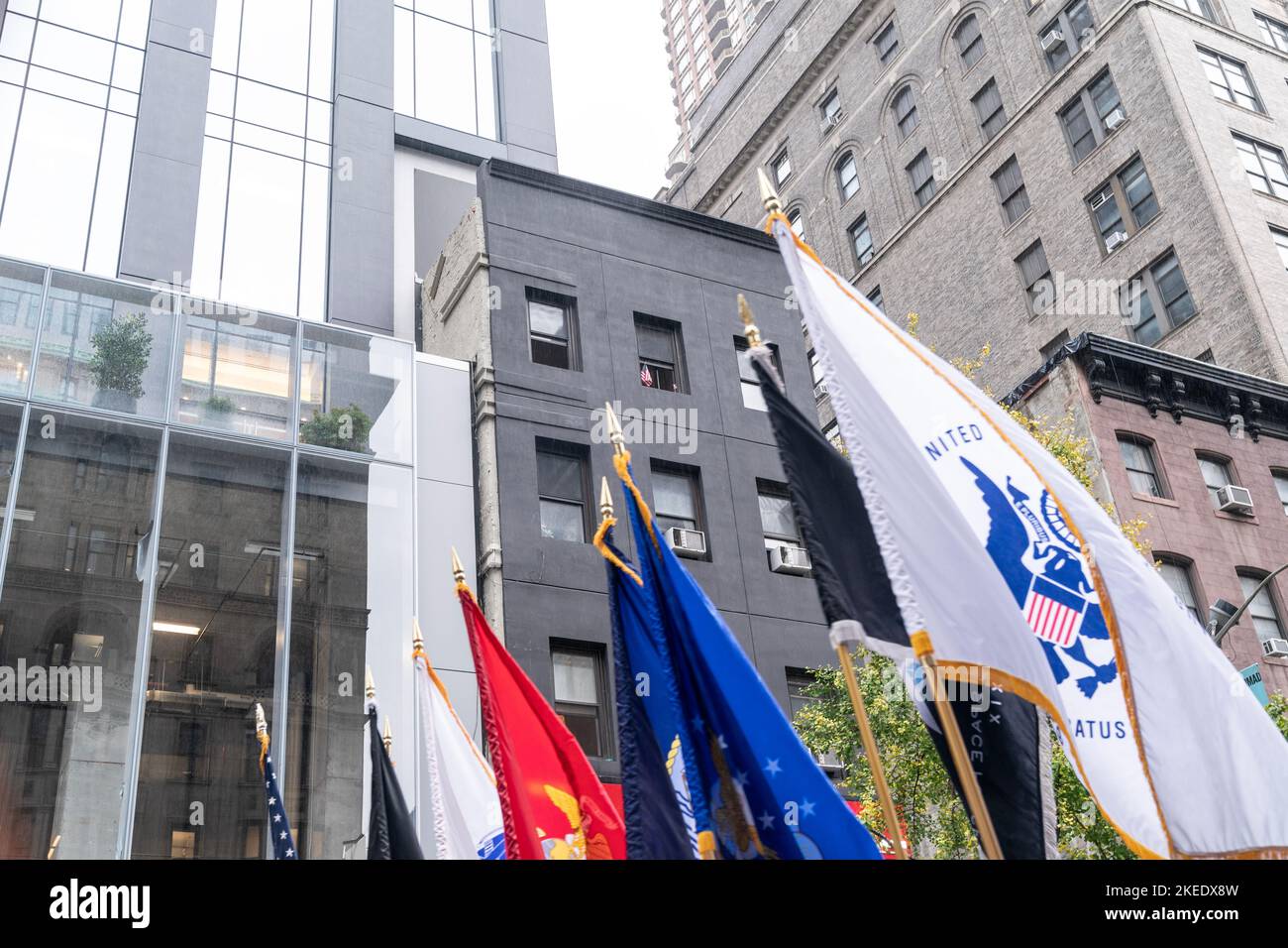 American flag seen in the window during annual Veterans Day parade on ...