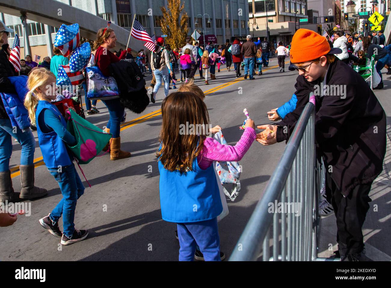 Kids hand out candy during the Veterans day parade. A Veterans day ...