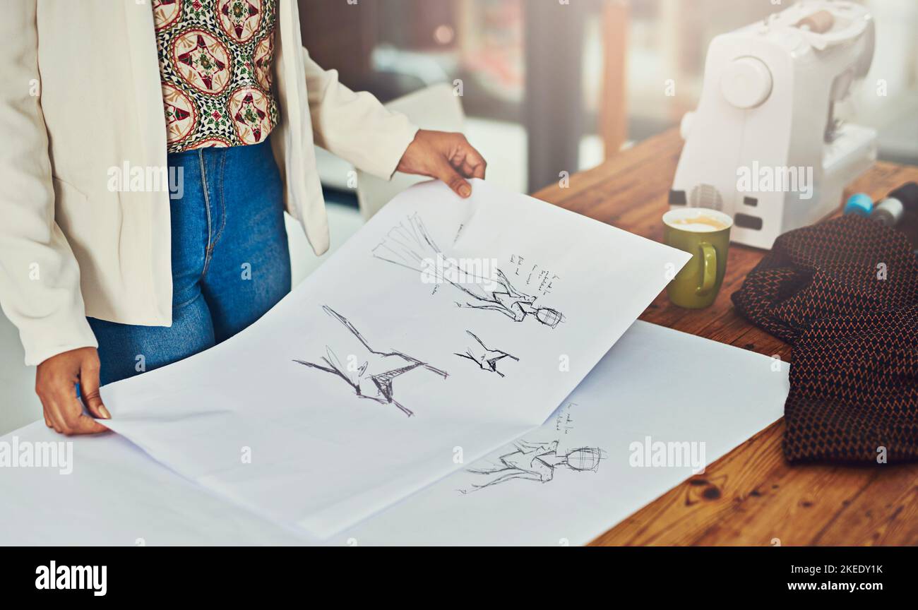 Her talent is clear in this creation. a fashion designer working on a ...