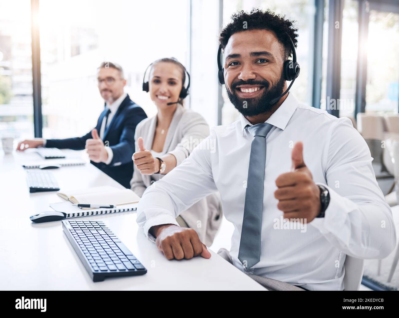 Thumbs up, call center staff and black man, success in the workplace ... Thumbs up, call center staff and black man, success in the workplace ...