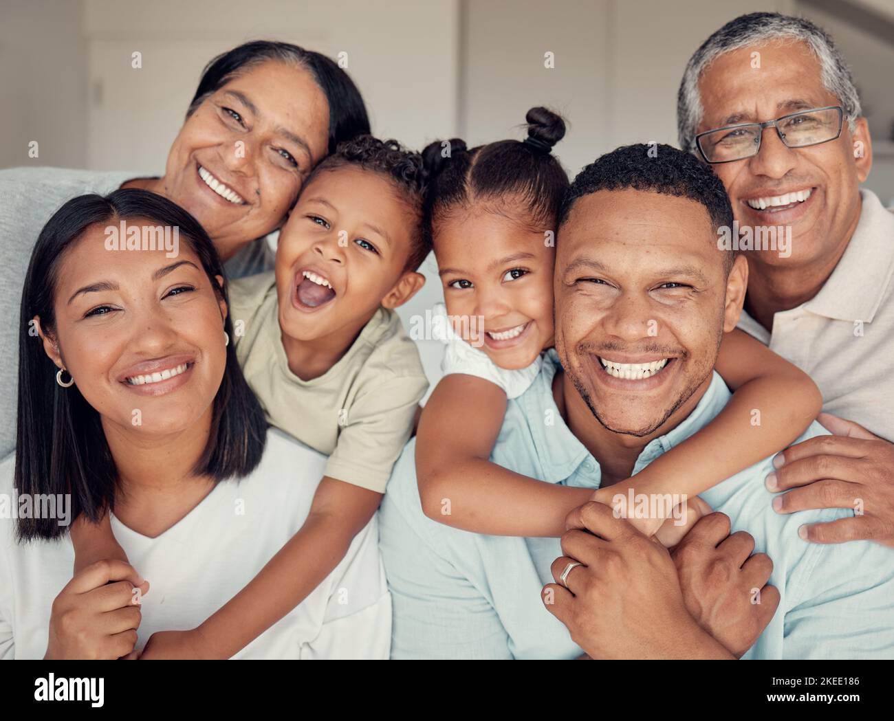 Big family, portrait and children hug parents in Costa Rica home with ...