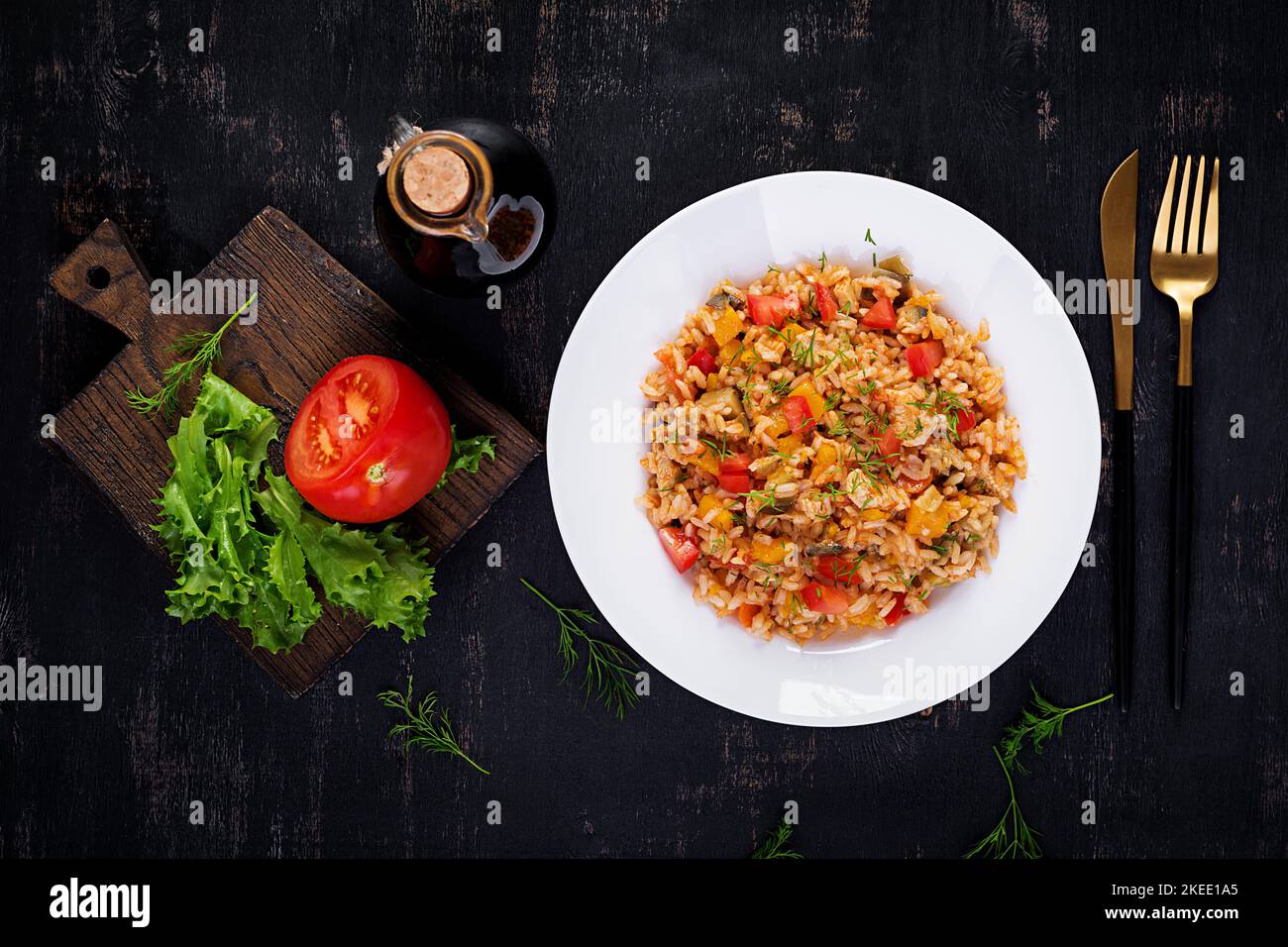 Tomato rice with vegetables and chicken. Healthy food. Healthy ...