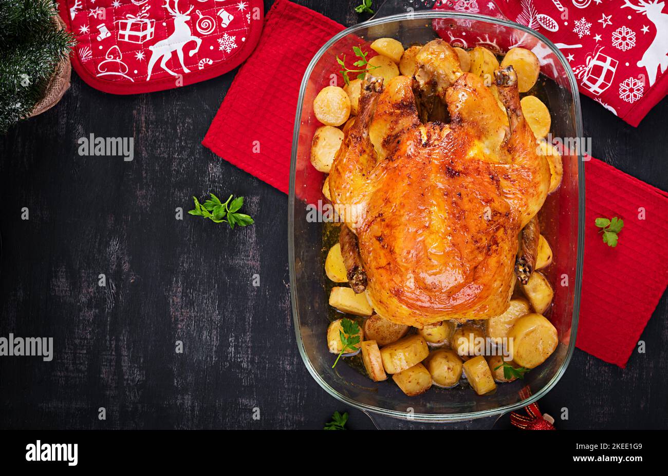 Baked turkey or chicken. The Christmas table is served with a turkey ...