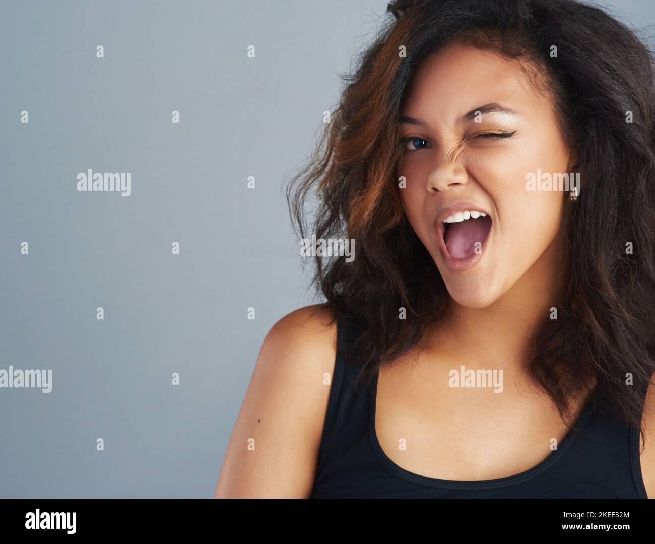 Grey eyes wink woman hi-res stock photography and images - Alamy