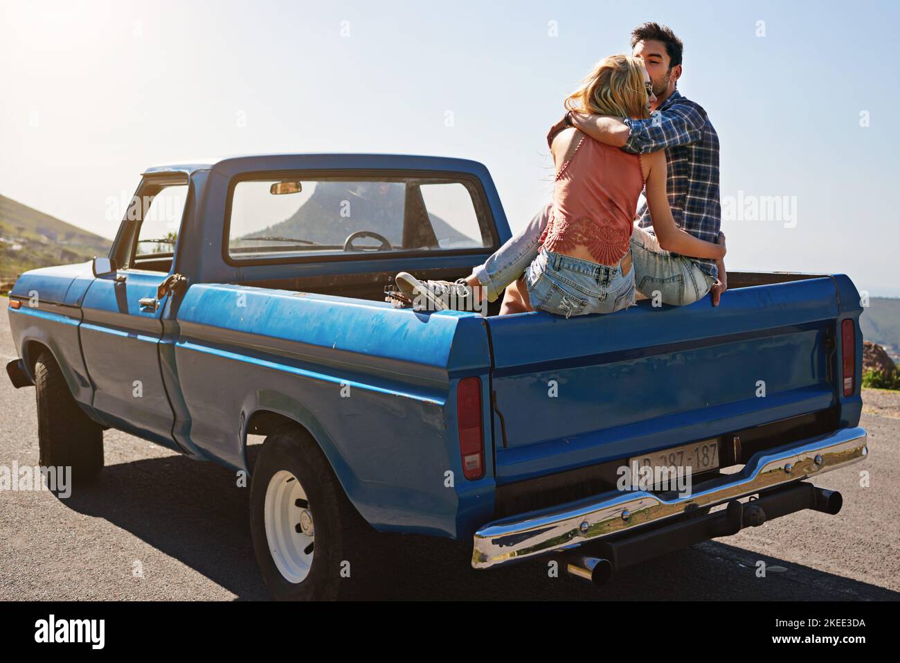 Spending quality time on a couples road trip. a young couple relaxing ...