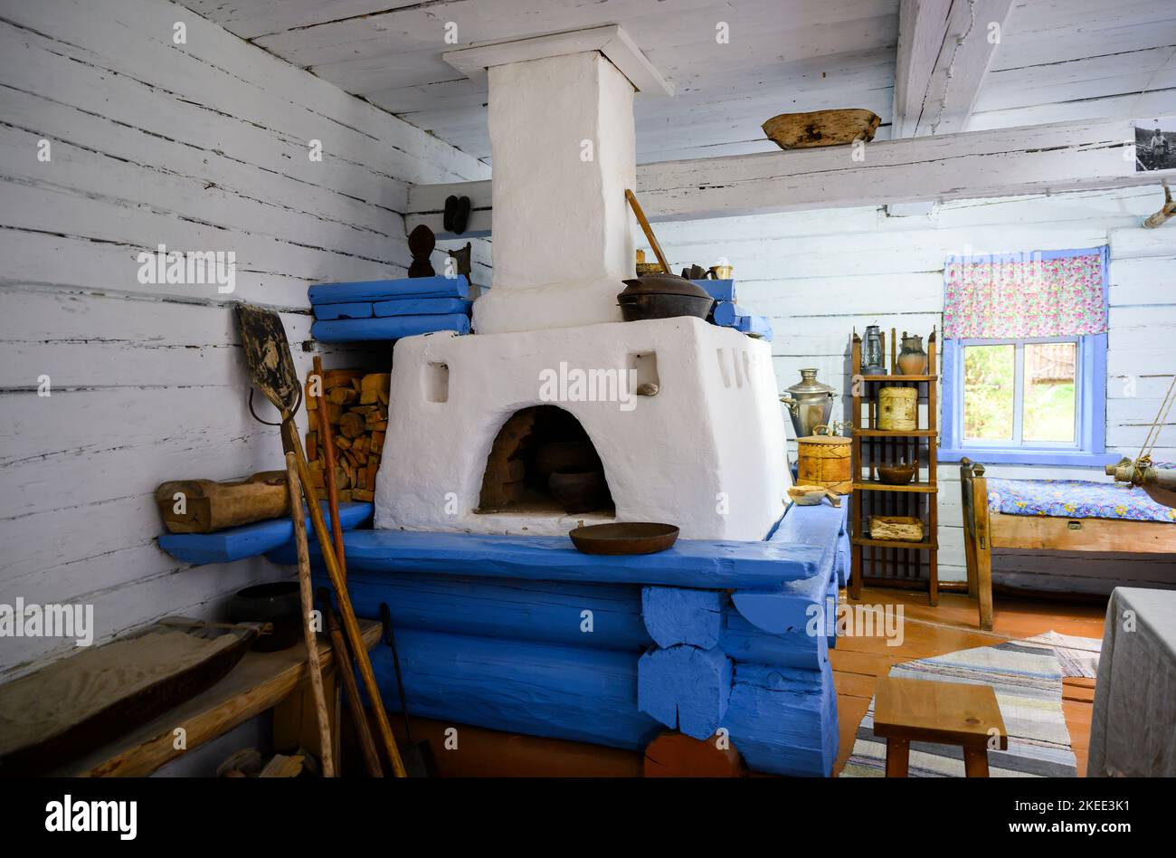 Traditional Russian oven in the interior of the Shorsky wooden house ...