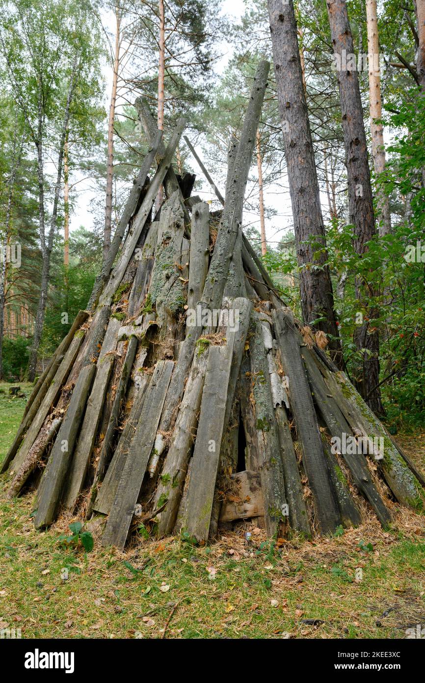 A replica of the medieval Odag hunting camp in Siberian forest in ...