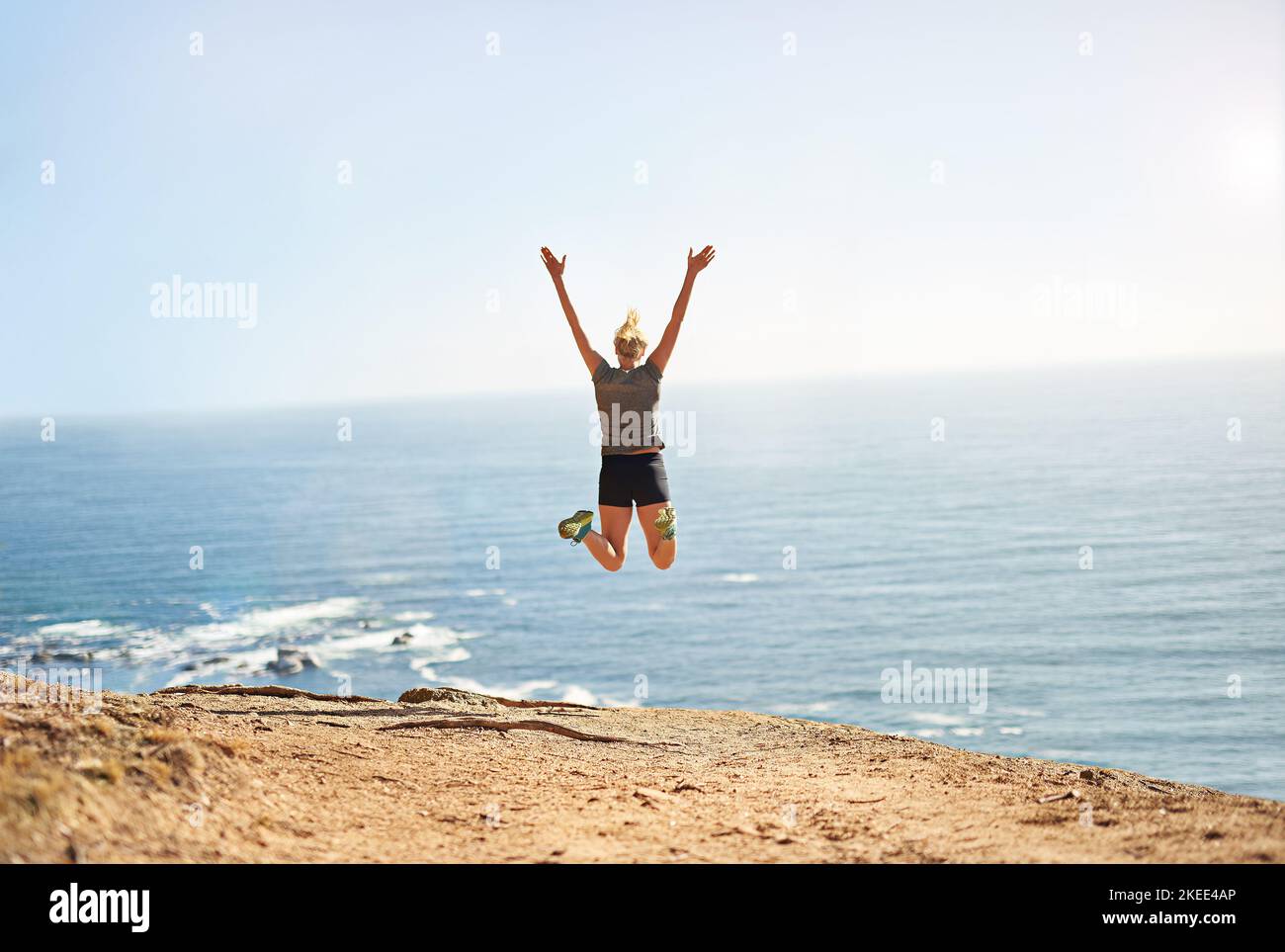 Theres no better feeling than I made it. a young woman jumping for joy ...