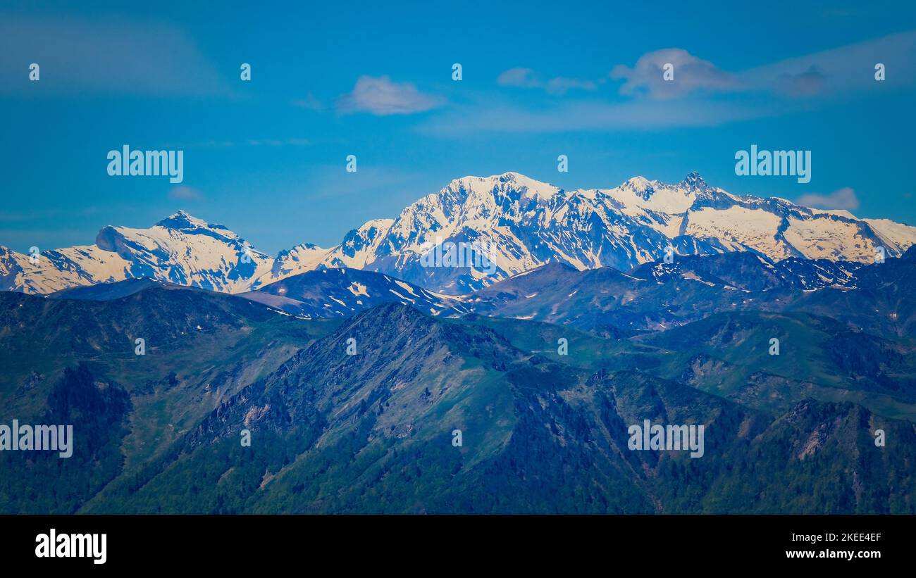 View on the snow covered Pyrenees mountains range from the summit of ...