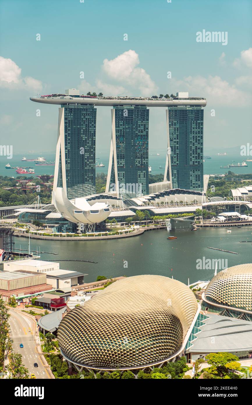 A vertical shot of Marina Bay Sands hotel and the bay in Singapoe in ...
